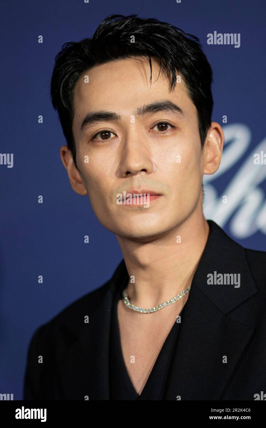Zhu Yilong poses for photographers upon arrival at the Chopard trophy dinner during the 76th ...