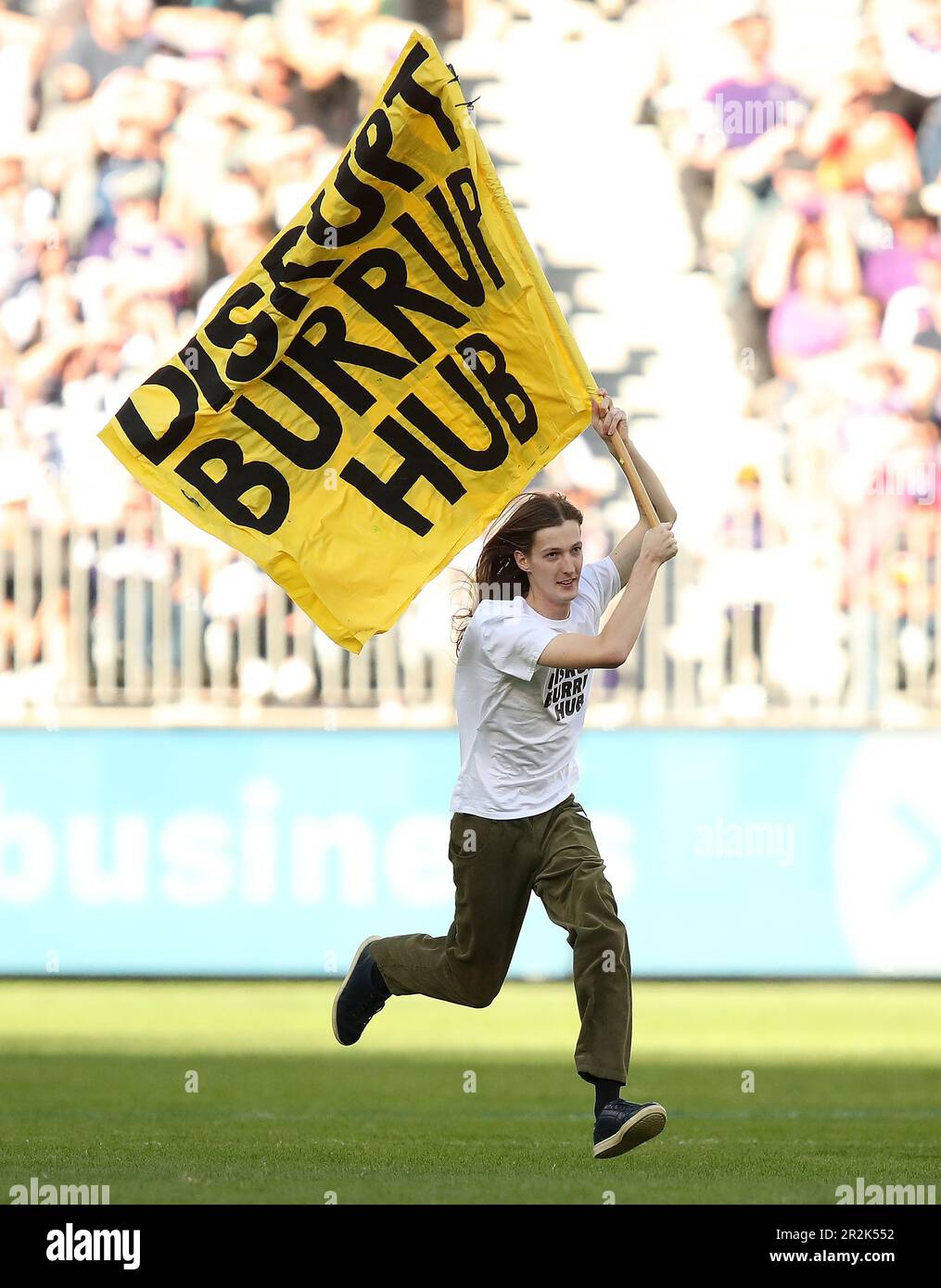 A pitch invader is seen during the AFL Round 10 match between the ...