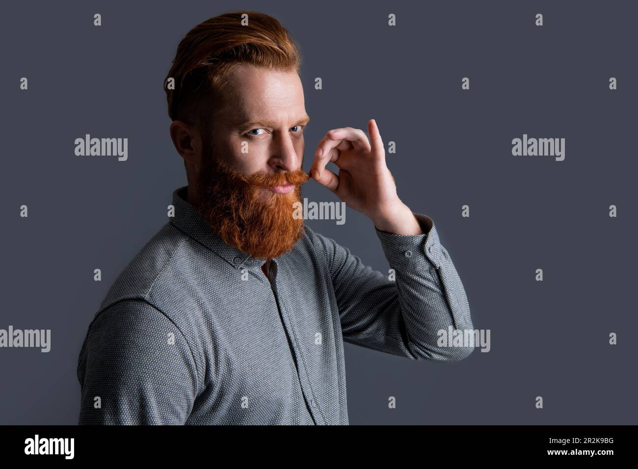Bearded man twirling mustache hi-res stock photography and images - Alamy
