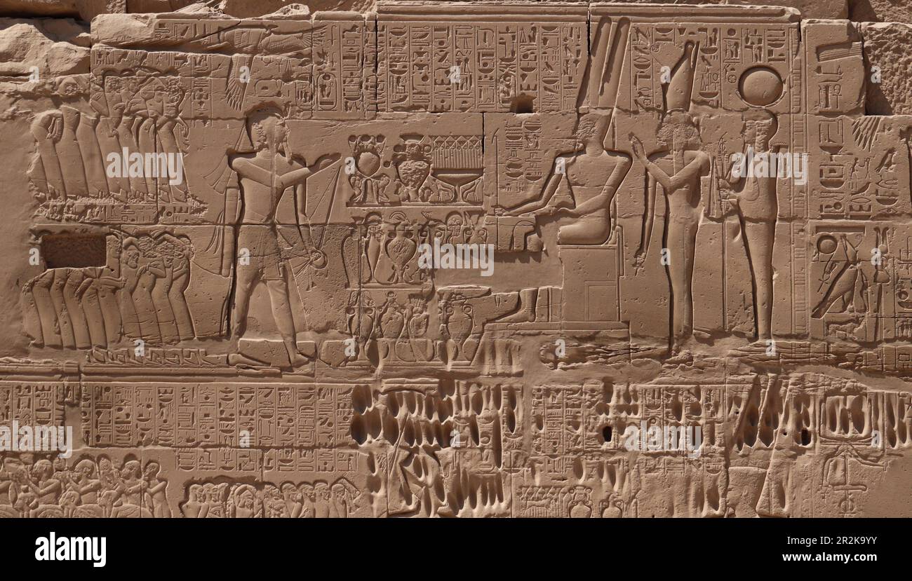 Ancient egyptian symbols and hieroglyphs carved at walls of Karnak ...