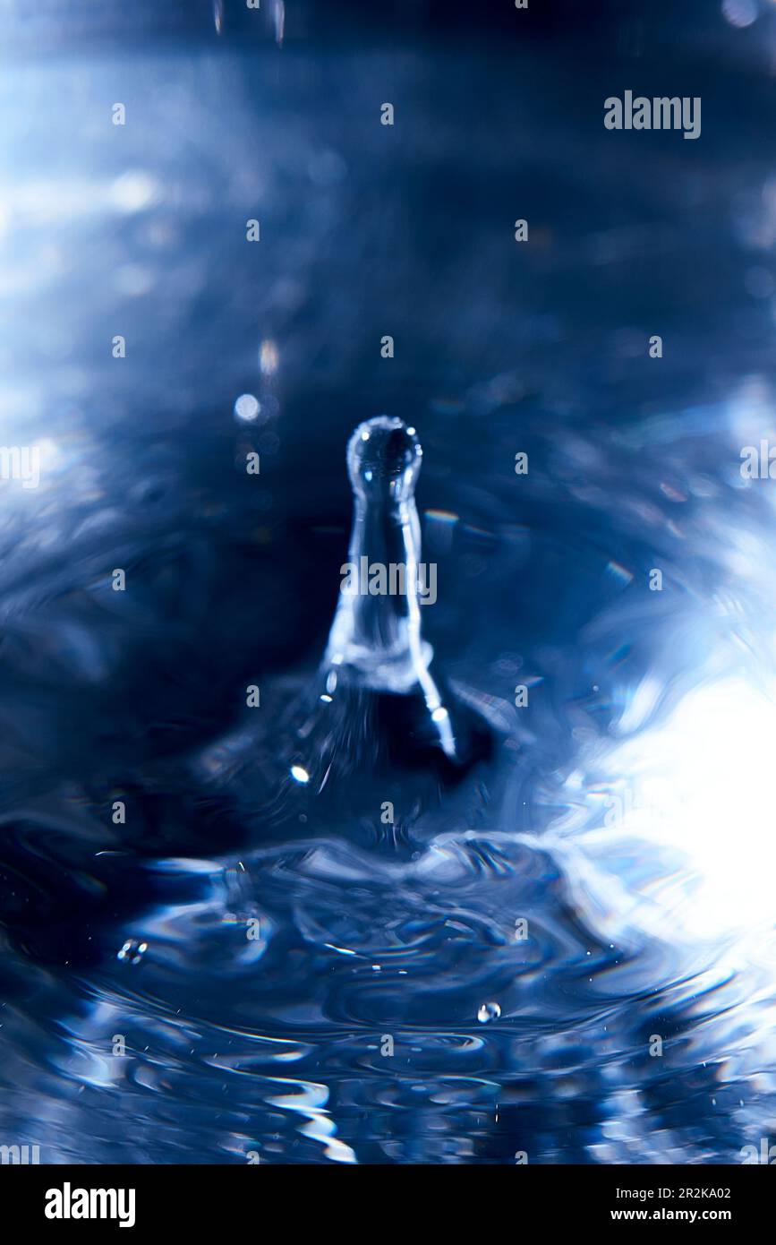 131.One or more drops of water splashing into waves and undefined ...