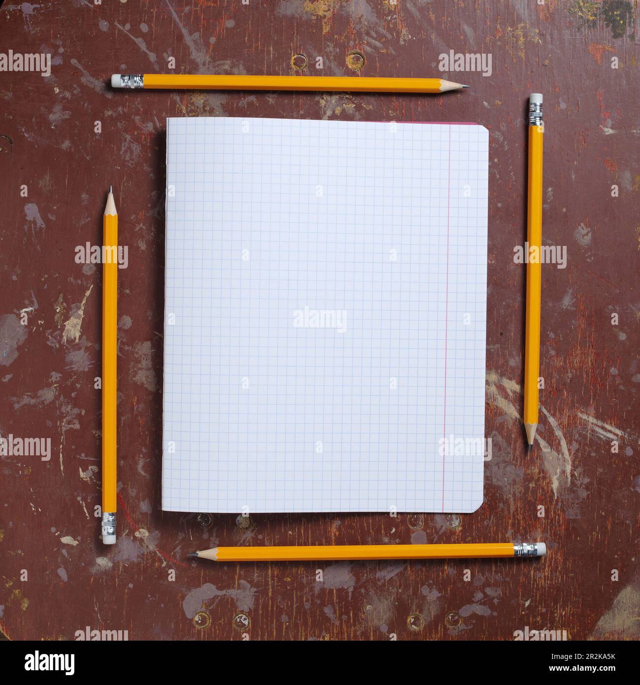 School notebook and pencils on dirty wooden background, top view Stock ...