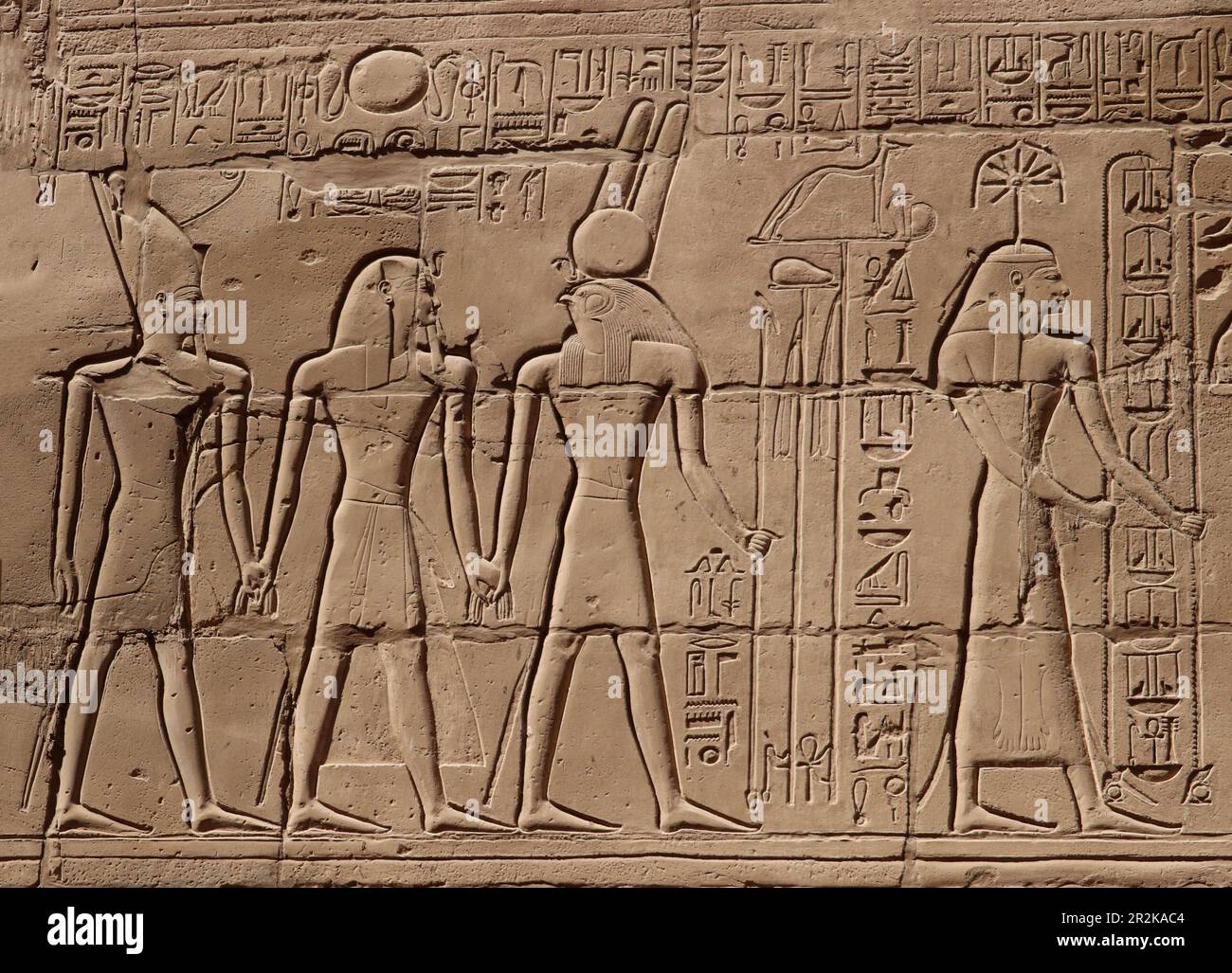 Ancient egyptian symbols and hieroglyphs carved at walls of Karnak ...