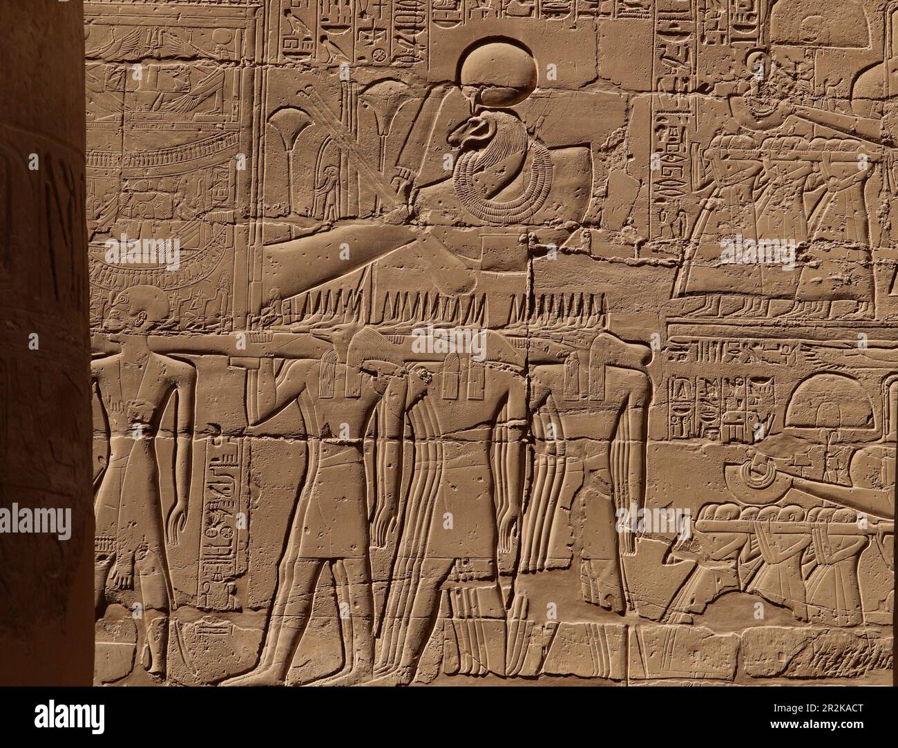 Ancient egyptian symbols and hieroglyphs carved at walls of Karnak ...