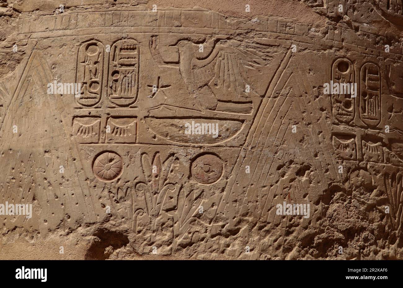 Ancient egyptian symbols and hieroglyphs carved at walls of Karnak ...