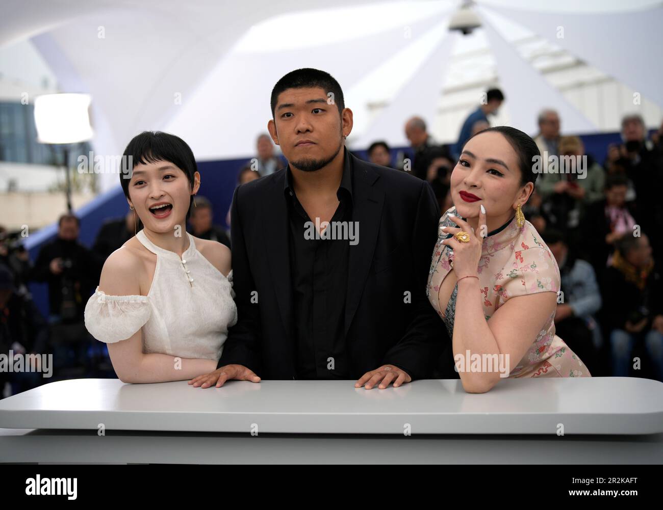 Liu Baisha, from left, Tong Lin Kai, and Chloe Maayan pose for ...