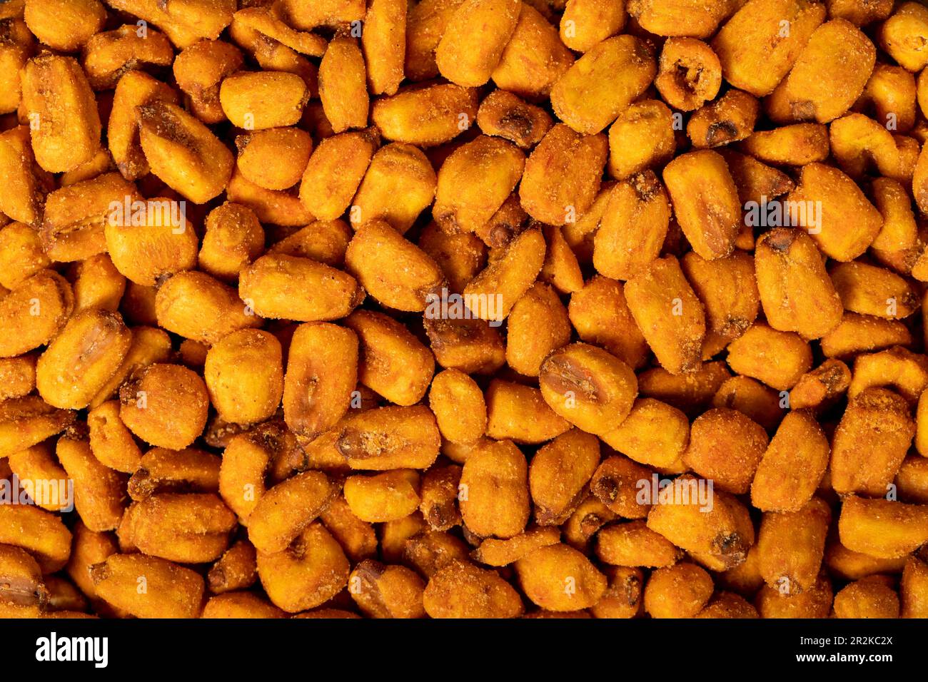 Corn nuts with sauce. Roasted corn snack close up food background. Top ...