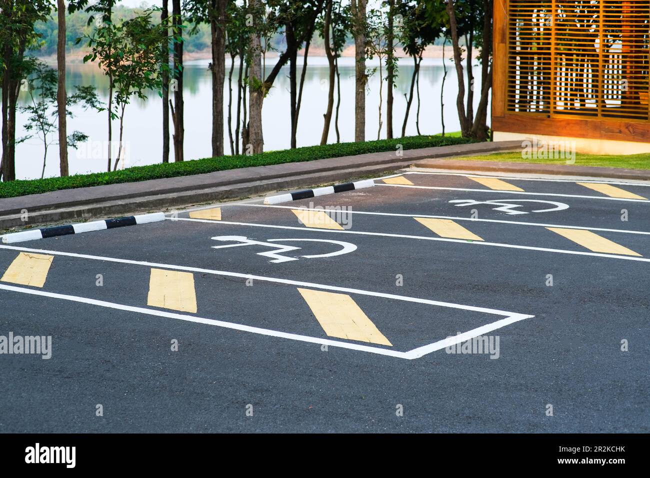 Handicapped parking spaces in the parking lot. Disabled parking sign ...