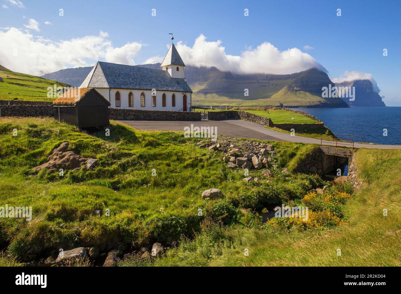 Vidareidi Church on Vidareidi, Faeroes. Shoreline, Cliffs, Sunny Stock ...