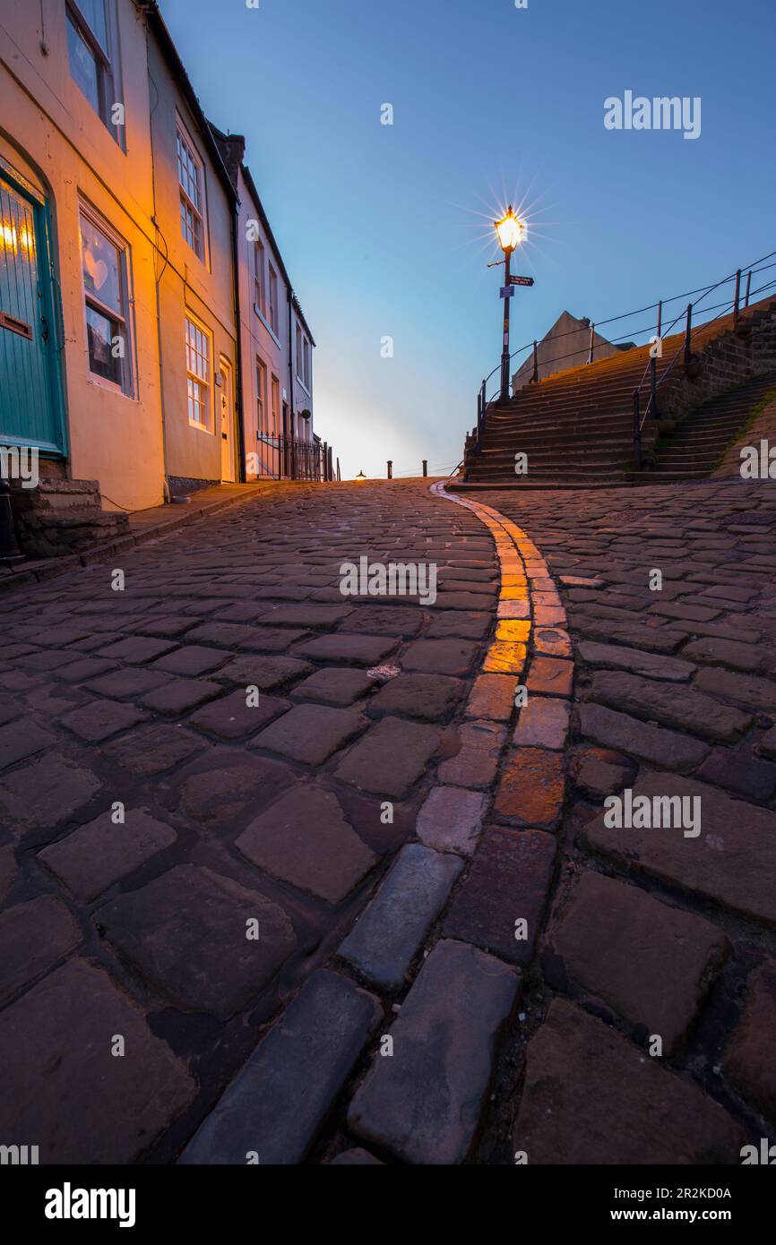 Evening lane in Whitby, Yorkshire, England, UK. deserted, illuminated ...