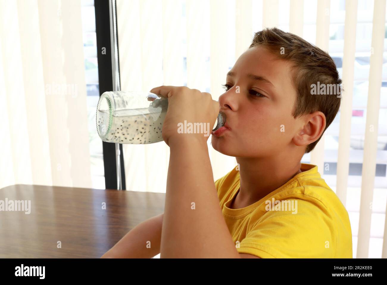 Child drinking lemonade from hi-res stock photography and images - Alamy