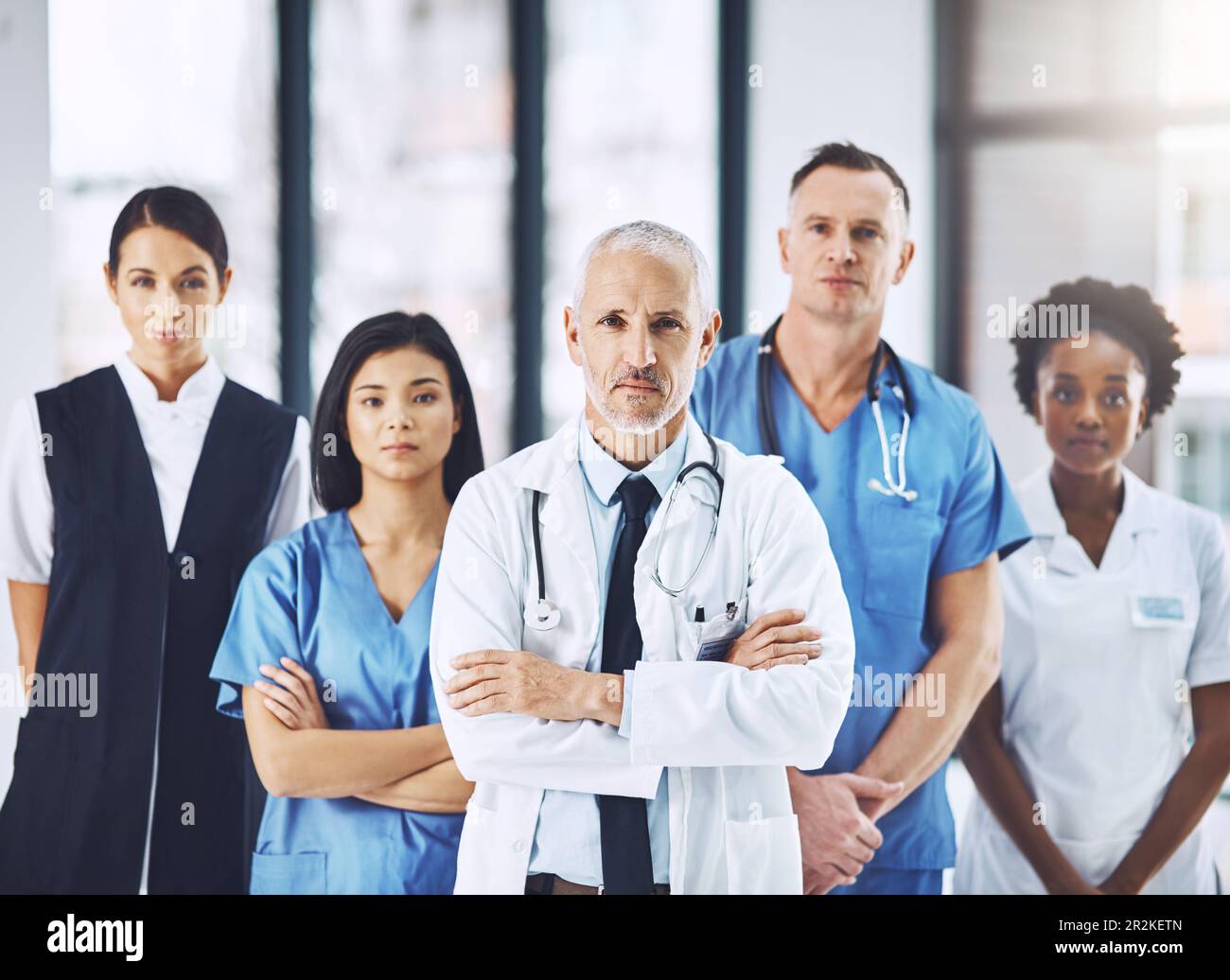 Team, senior doctor and portrait of nurses and doctors in hospital ...
