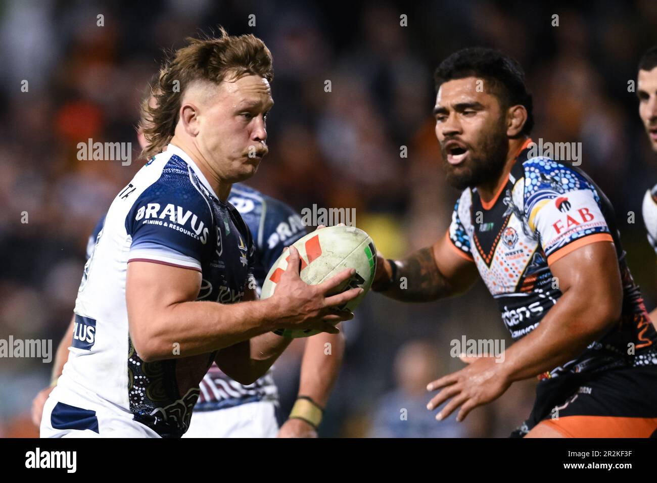 Reuben Cotter of the North Queensland Cowboys scores during the NRL ...
