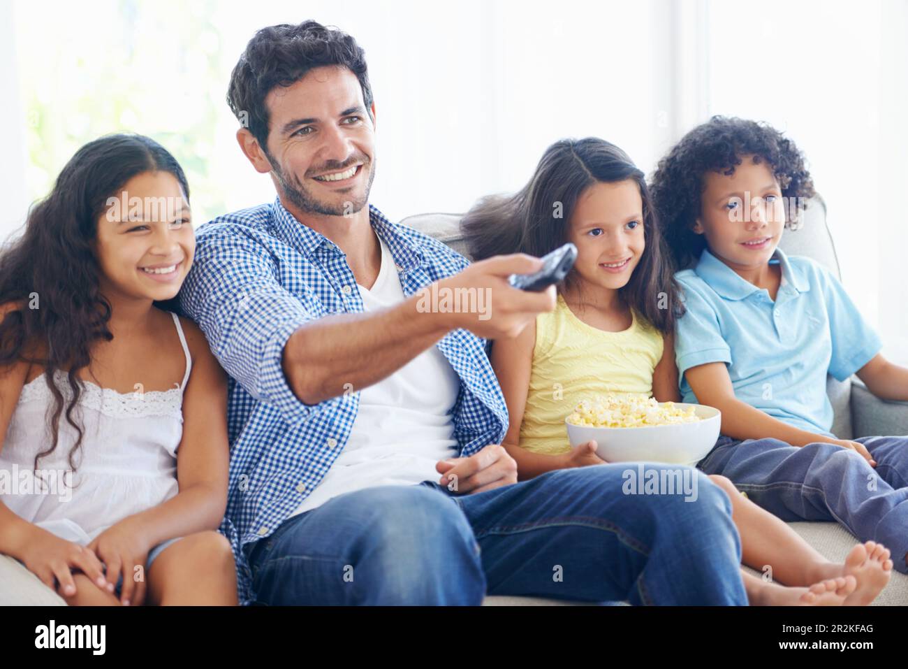 Happy family, relax father and children watching tv, subscription ...