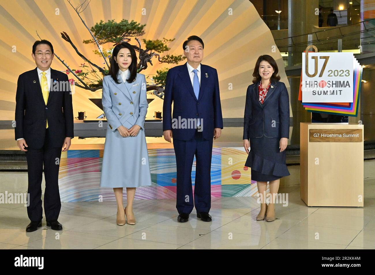 Japanese Prime Minister Fumio Kishida (L) and his wife Yuko welcome South Korea's President Yoon ...