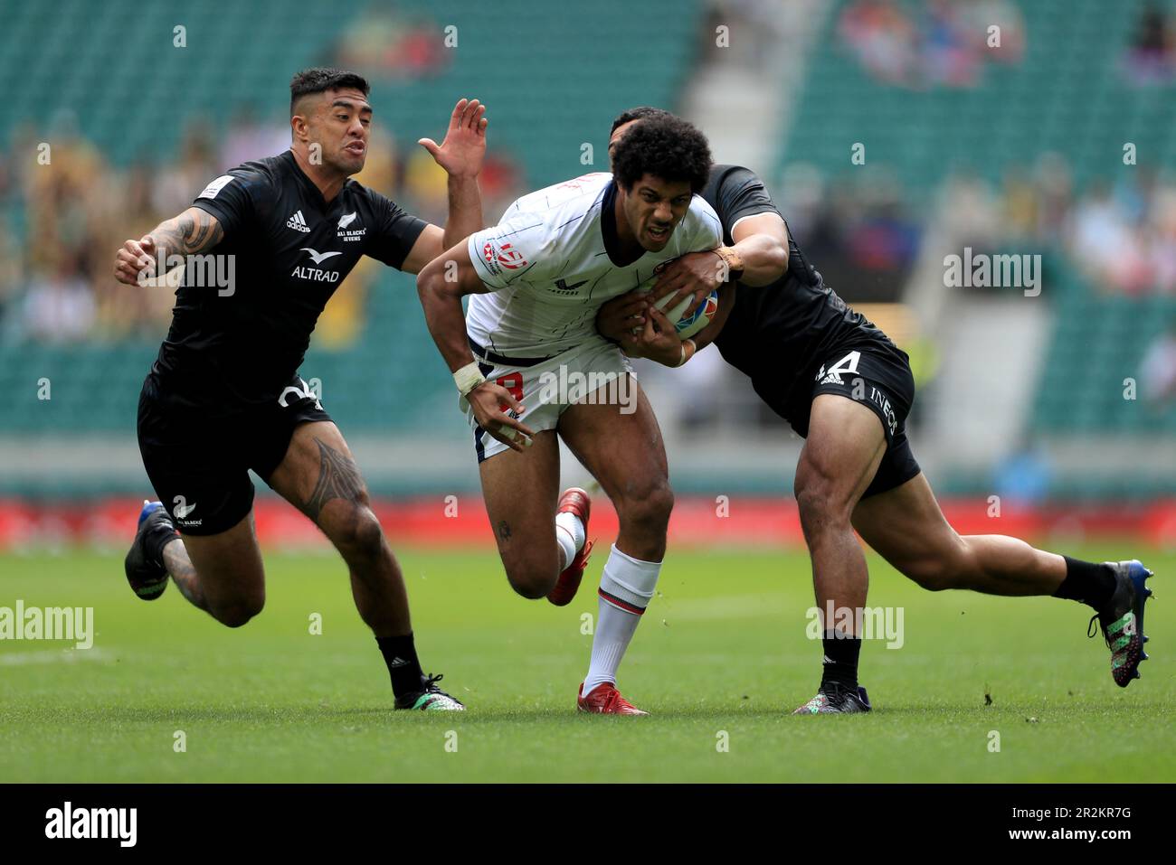 USA’s Malacchi Esdale is tackled by New Zealand’s Roderick Solo (right ...
