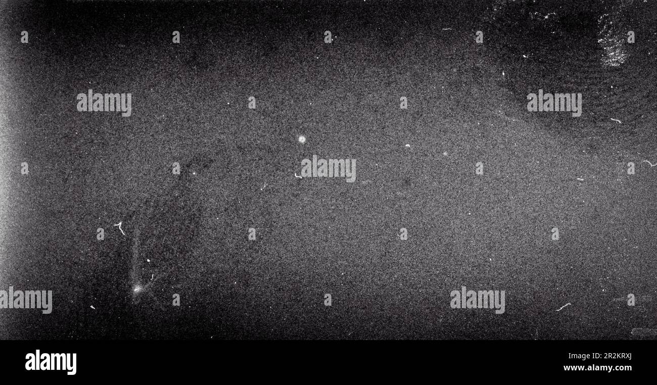Blank grained film strip texture background with heavy grain and dust ...