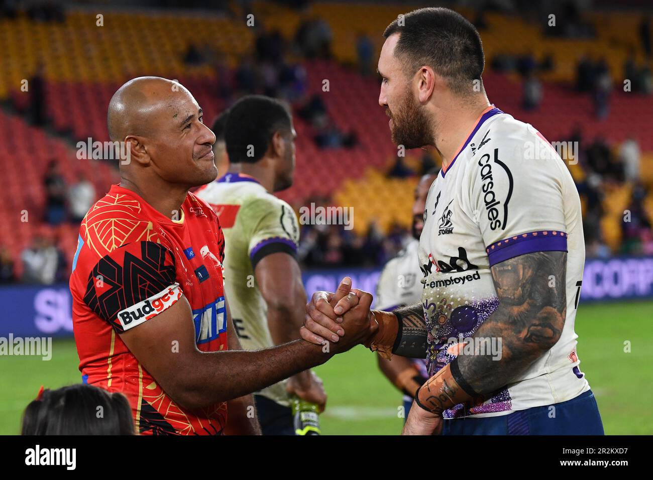 Felise Kaufusi of the Dolphins speaks with Nelson Asofa-Solomona of the ...
