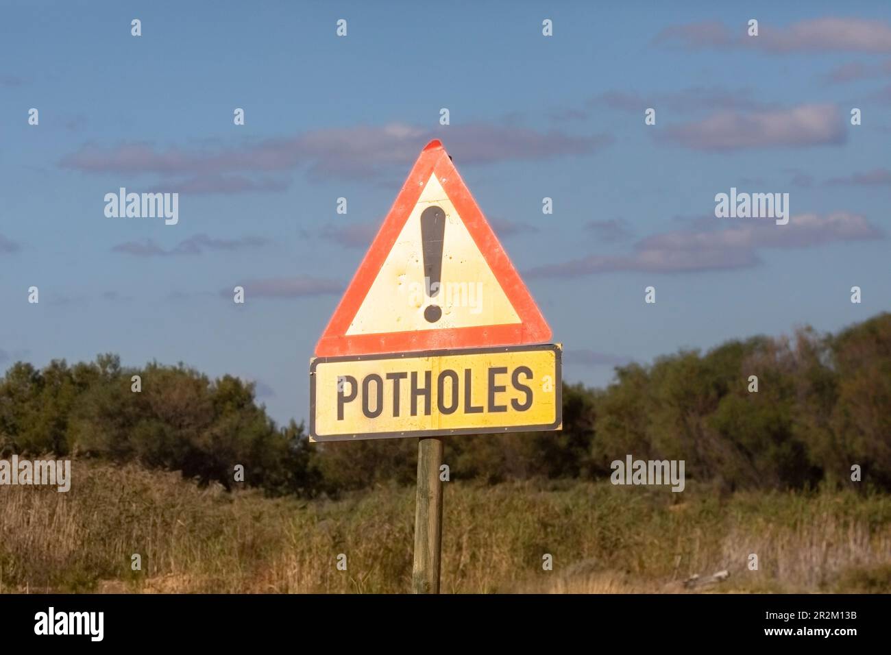 Pothole warning signboard hi-res stock photography and images - Alamy