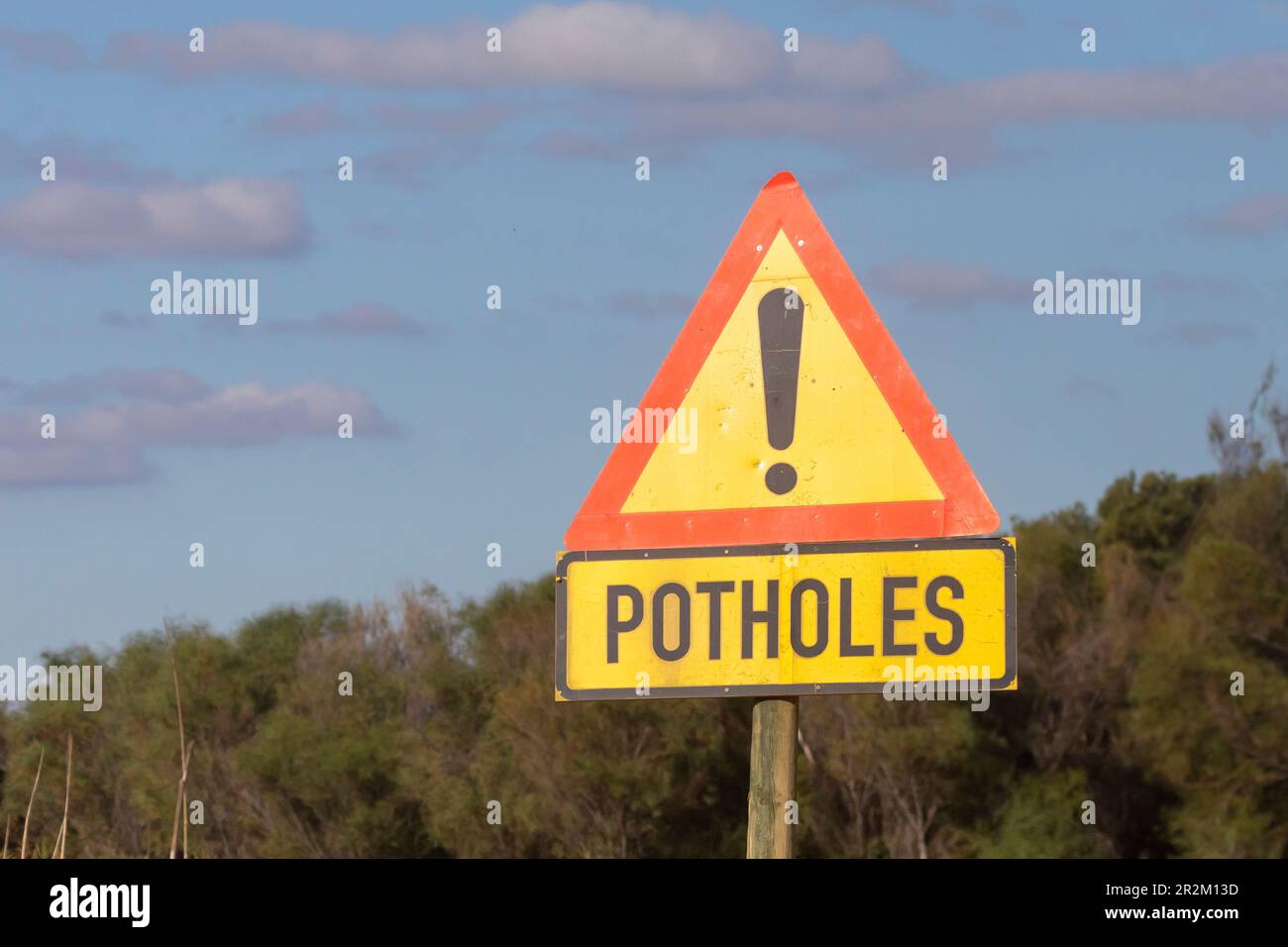 Pothole warning signboard hi-res stock photography and images - Alamy