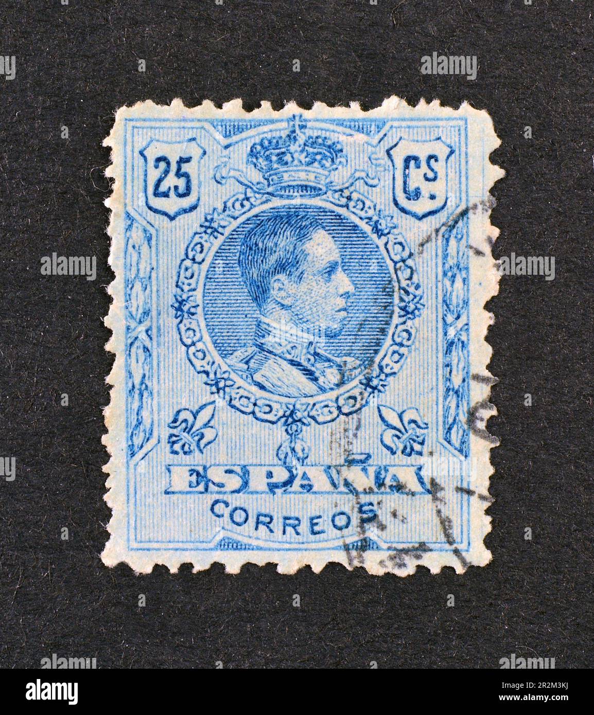Cancelled postage stamp printed by Spain, that shows portrait of king ...