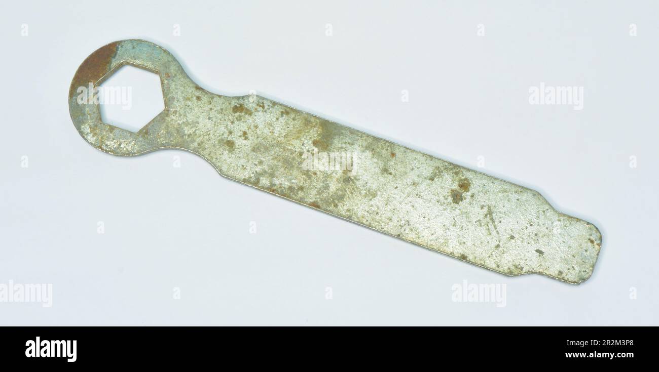Vintage metal tool wrench isolated on white background Stock Photo - Alamy