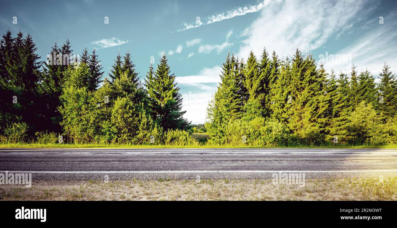 Beautiful highway road. Summer day landscape background Stock Photo - Alamy