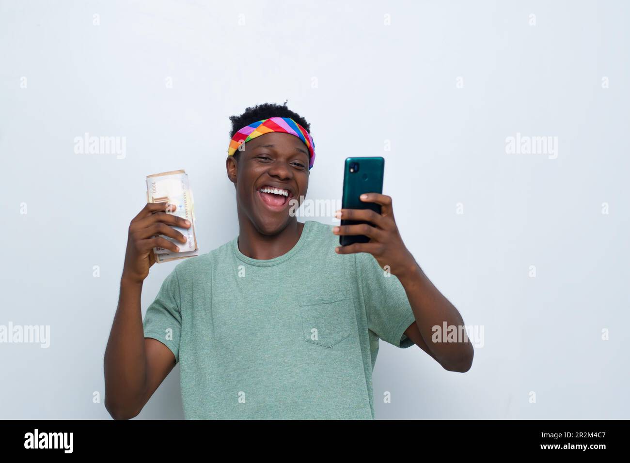 Excited young smiling african hi-res stock photography and images - Alamy