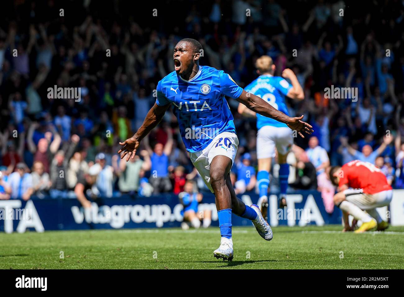 Isaac Olaofe #20 of Stockport County celebrates his goal to make it 1-0 ...