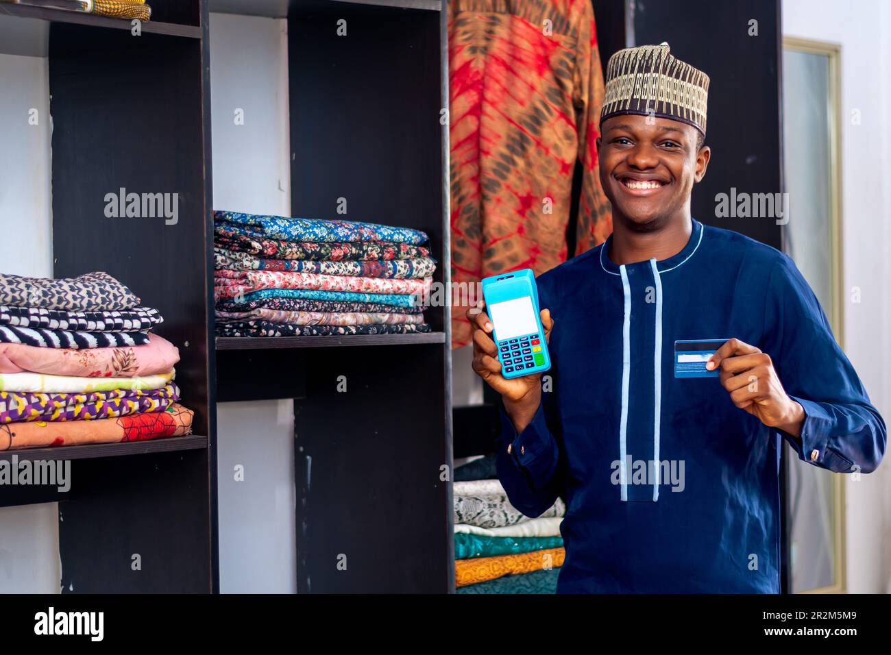 copy space image of african businessman holding pos with blank white ...