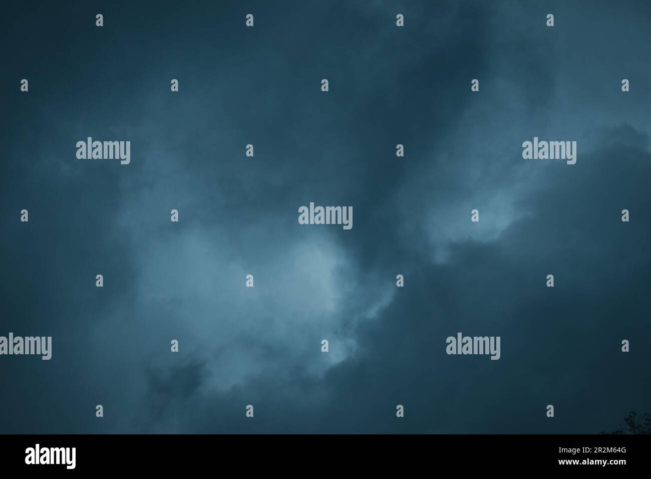 Dark and moody clouds forming a storm Stock Photo - Alamy