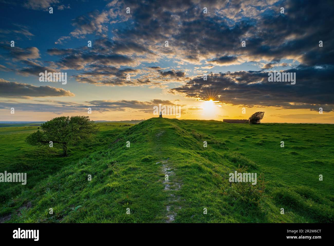A Trigpoint stands on the South Downs countryside at Devil's Dyke ...