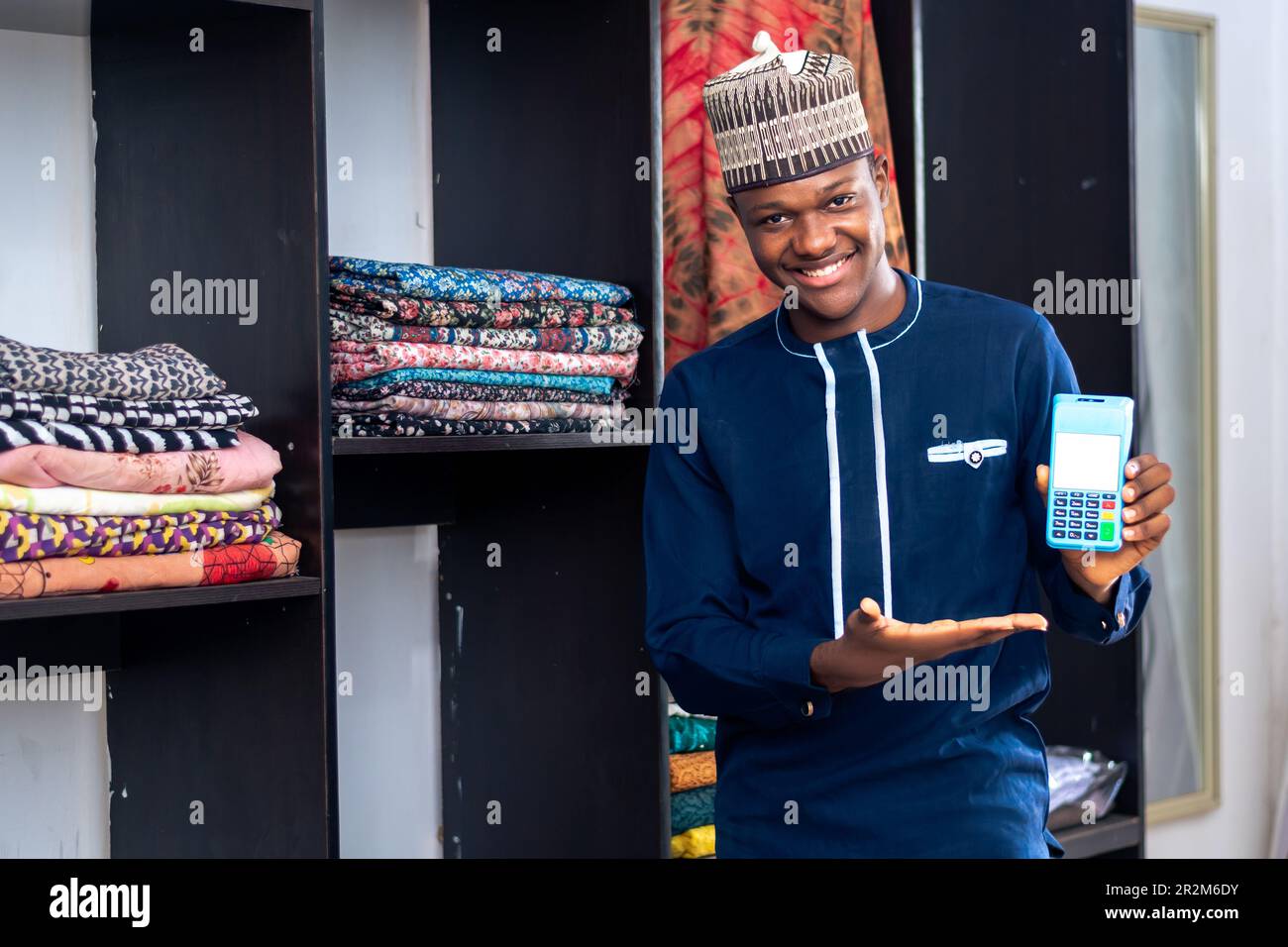 copy space image of african businessman holding pos with blank white ...