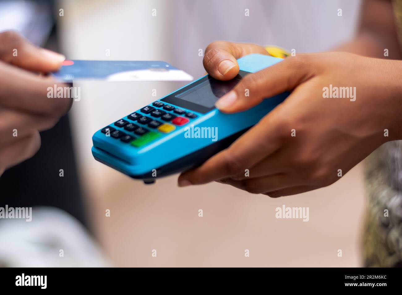 customer making payment with a atm card and pos Stock Photo - Alamy