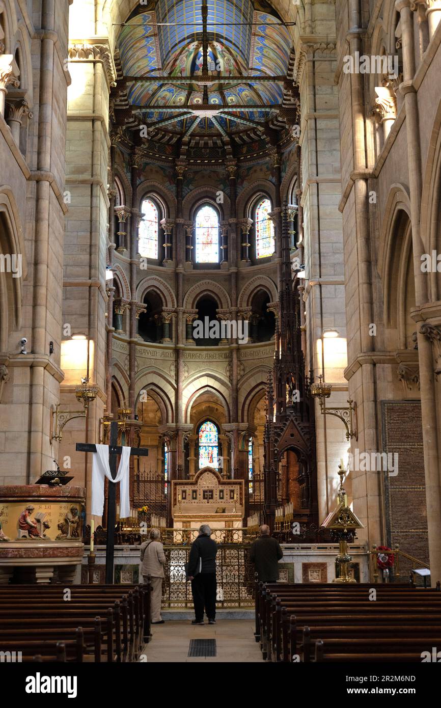 Visitors admiring the interior of Saint Fin Barre's Cathedral in Cork ...