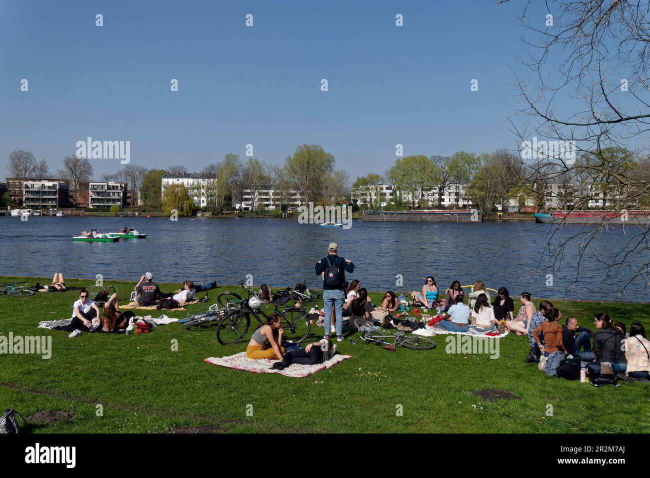 Spree riverside, Tretower Park, spring, people relaxing Stock Photo - Alamy