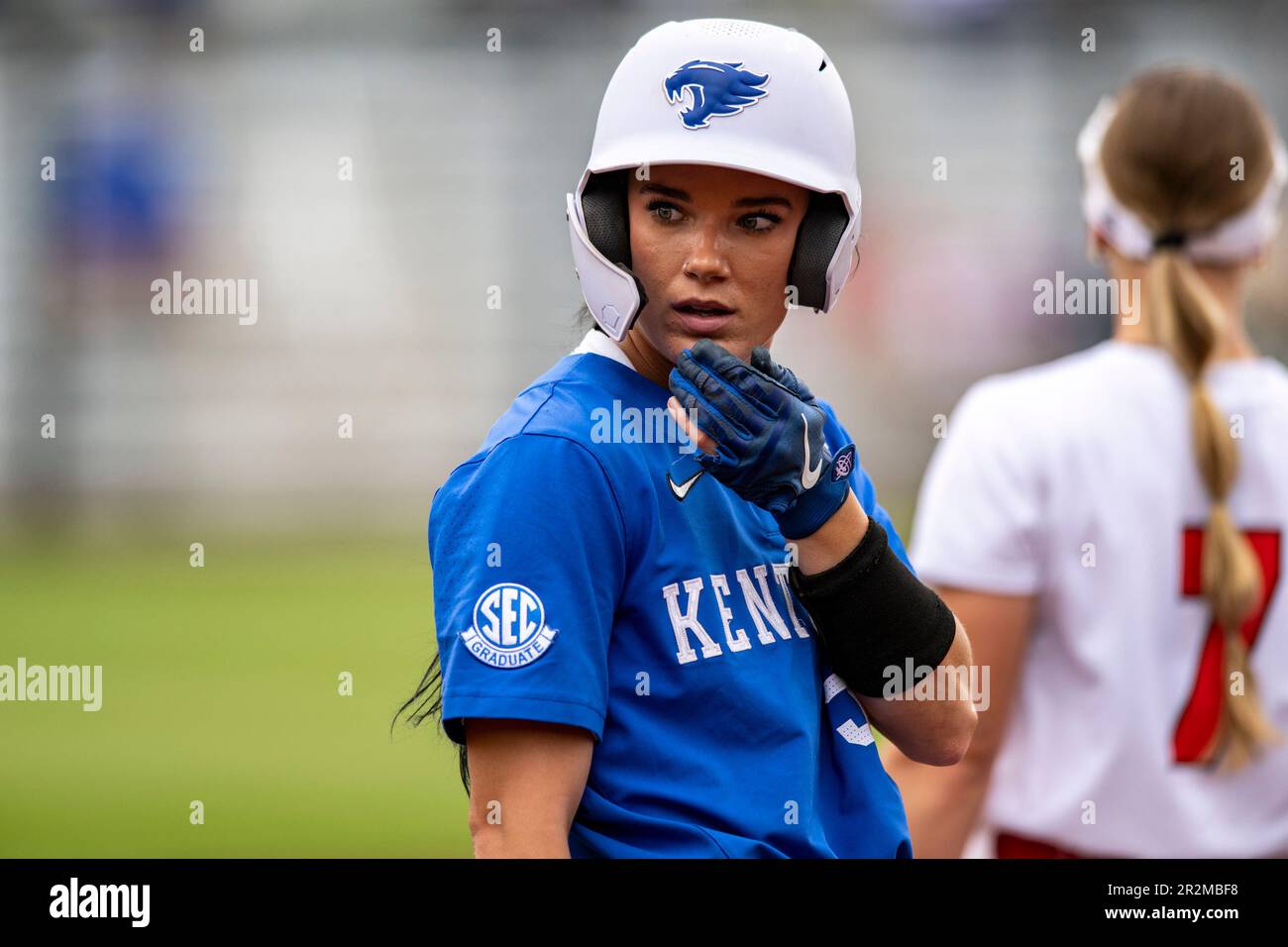 Kentucky outfielder Kayla Kowalik (99) reacts while standing on third ...