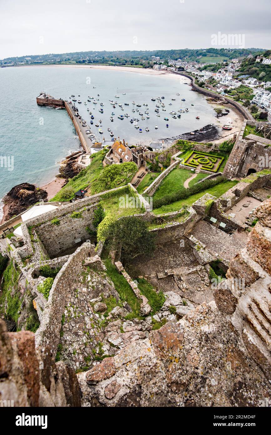 Castle grounds, walls,tidal harbour and pier at Gory....Mont Orgueil ...