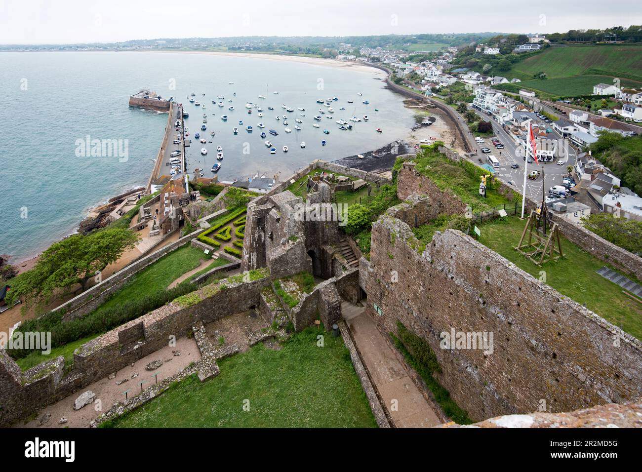 Castle grounds, walls,tidal harbour and pier at Gory....Mont Orgueil ...