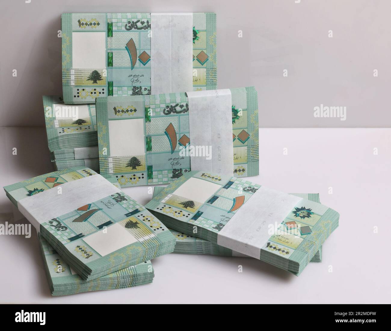 Stacks of Lebanese pounds, 100,000 denomination, symbolizing the ...