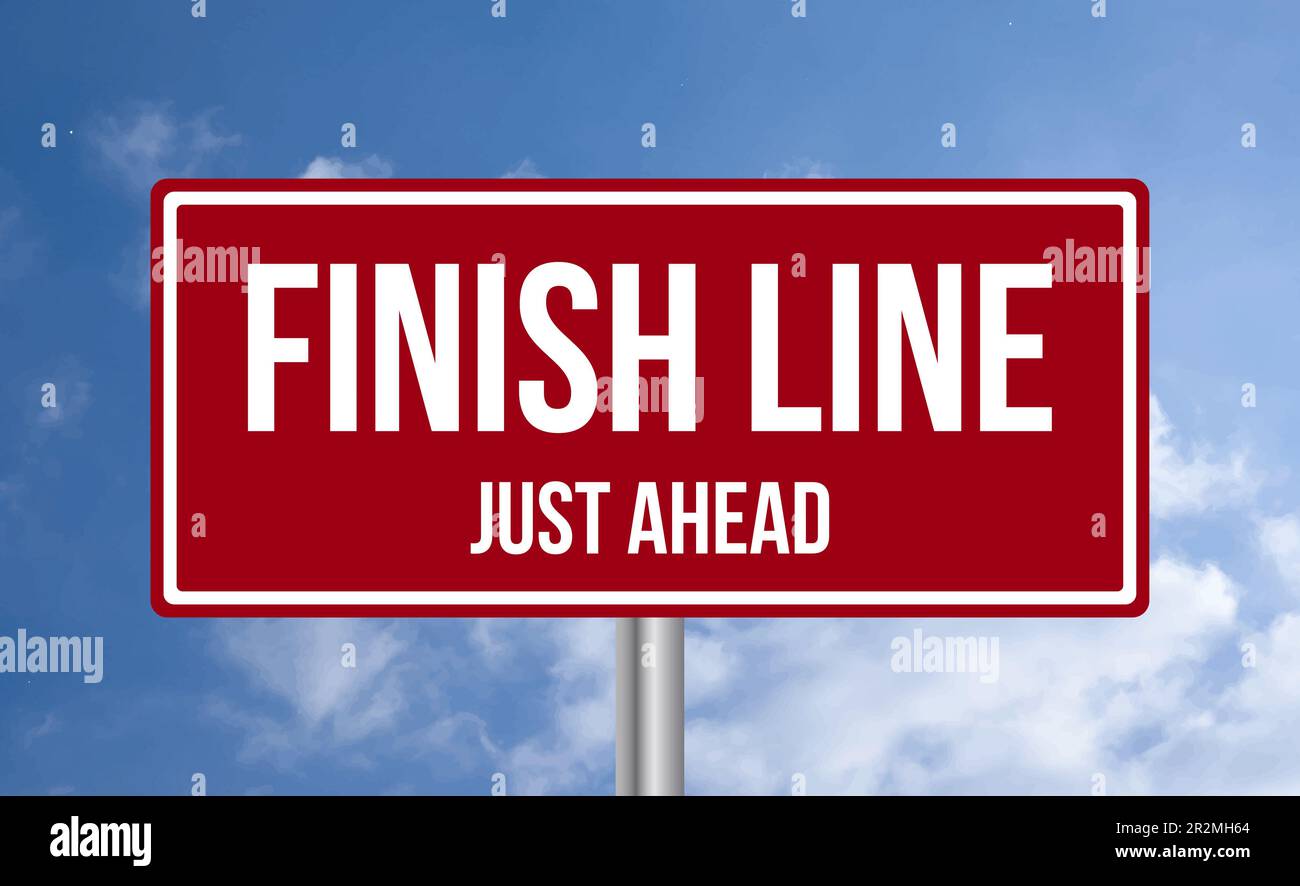 Finish Line just ahead road sign on sky background Stock Photo - Alamy