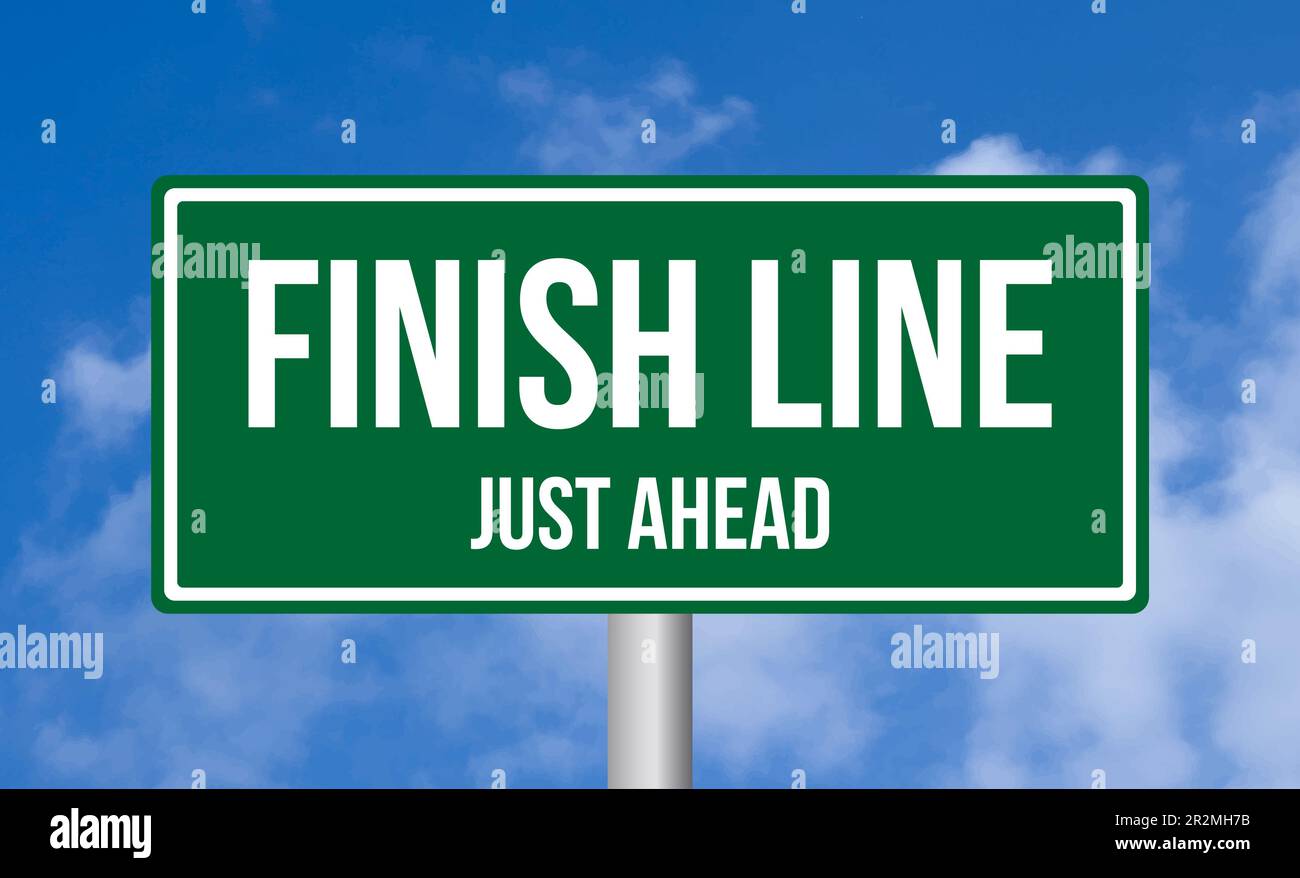 Finish Line just ahead road sign on sky background Stock Photo - Alamy