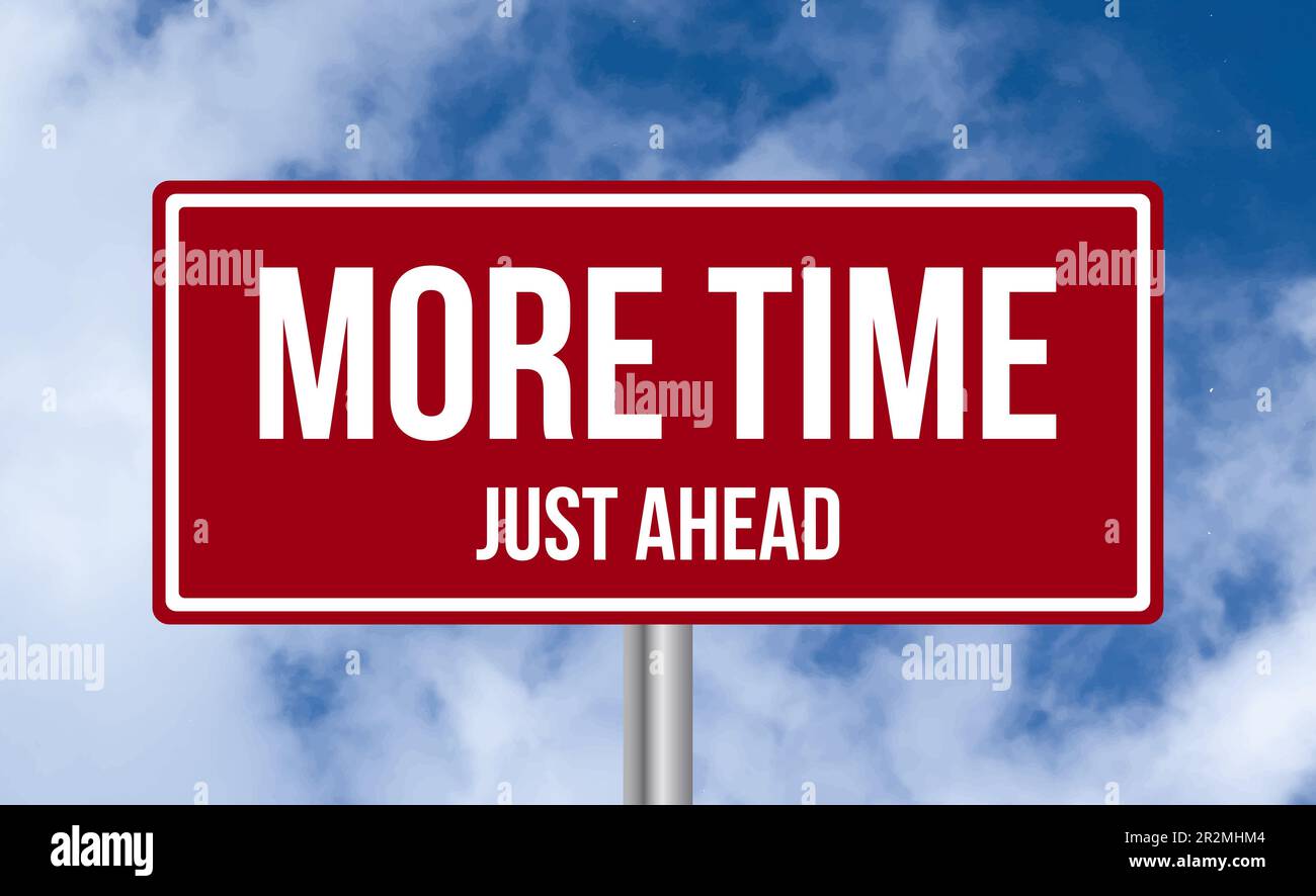More Time just ahead road sign on cloudy sky background Stock Photo - Alamy