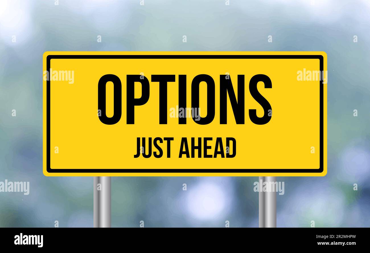 Options just ahead road sign on blur background Stock Photo - Alamy