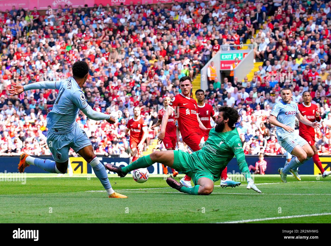 Liverpool goalkeeper Alisson Becker saves a shot from Aston Villa's ...