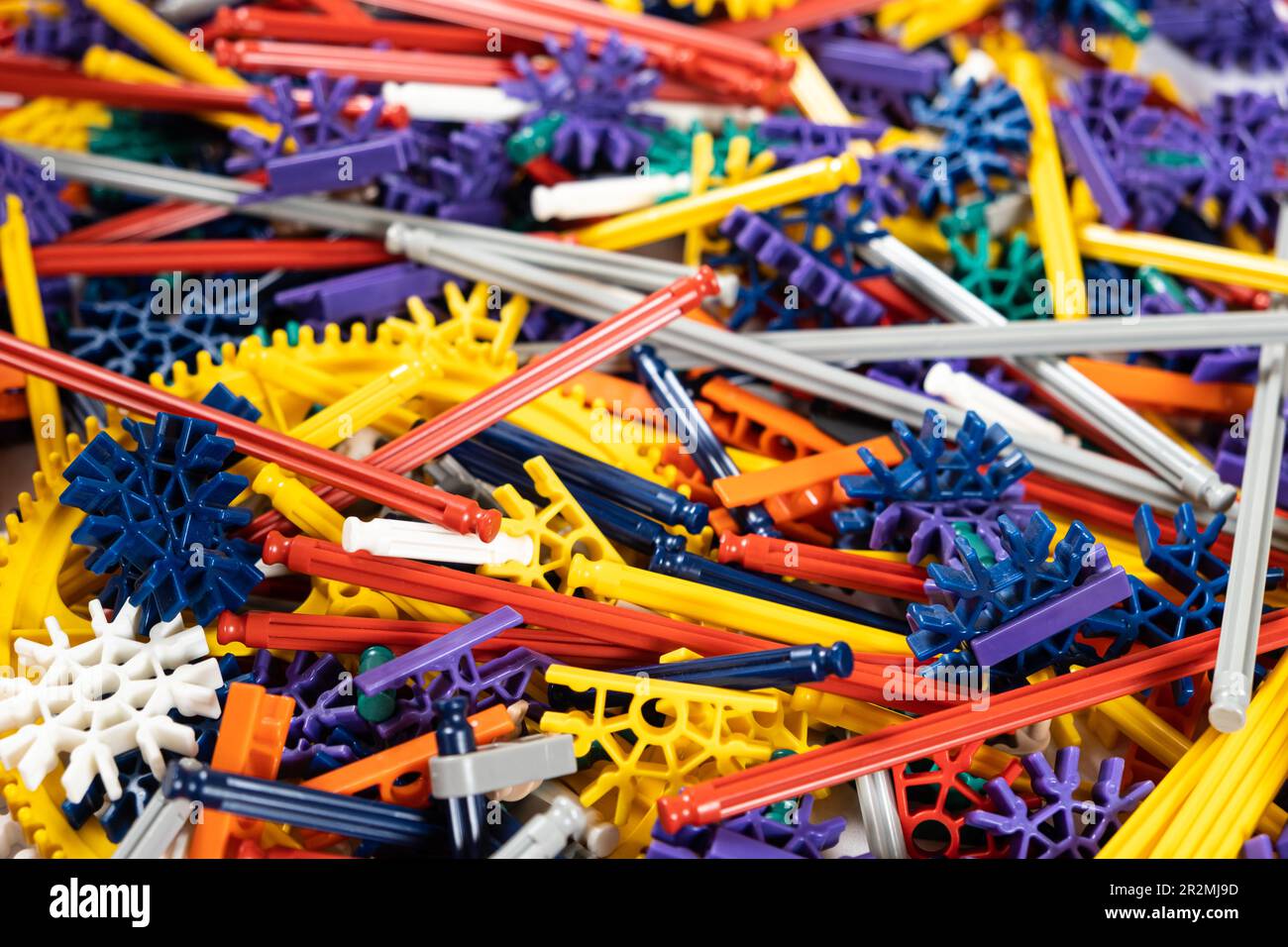 Children's constructor of gears cogwheel and sticks in the children's ...