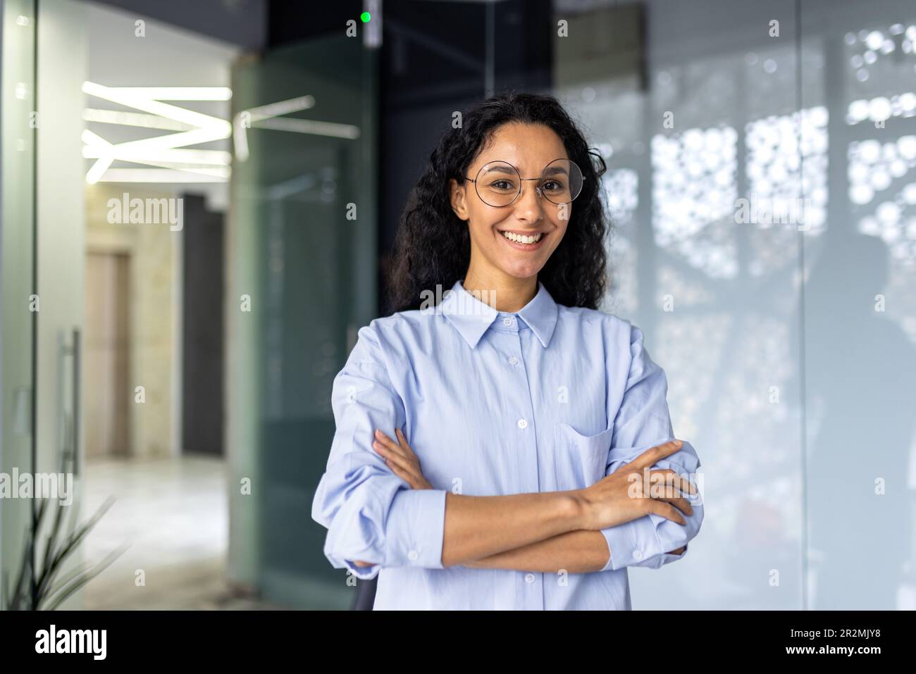 Portrait of happy and successful business woman, boss in shirt smiling ...