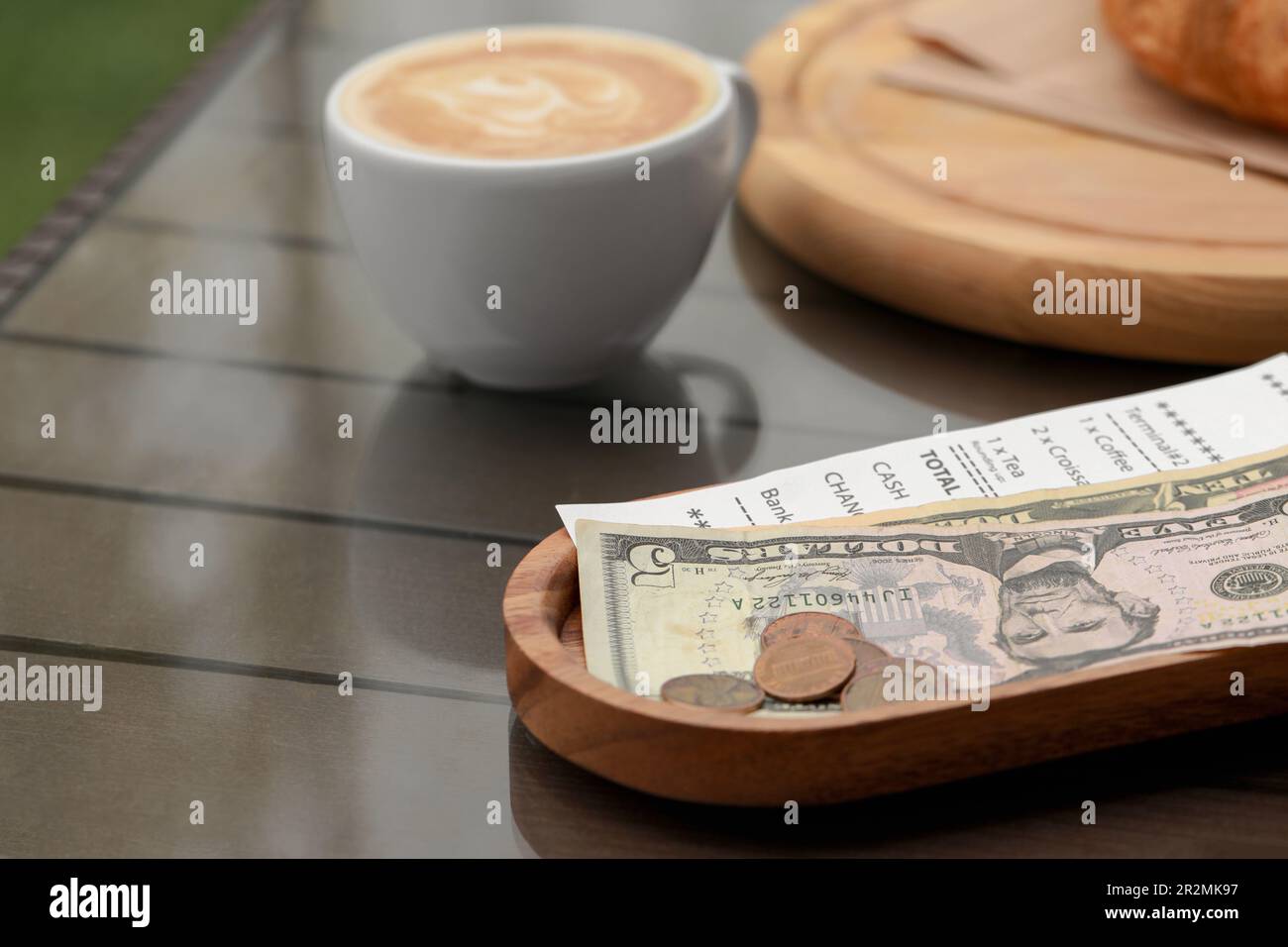 Cup coffee on table coins hi-res stock photography and images - Alamy
