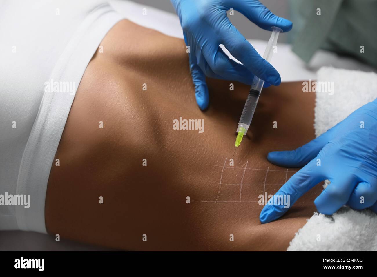 Syringe doctor belly hi-res stock photography and images - Alamy