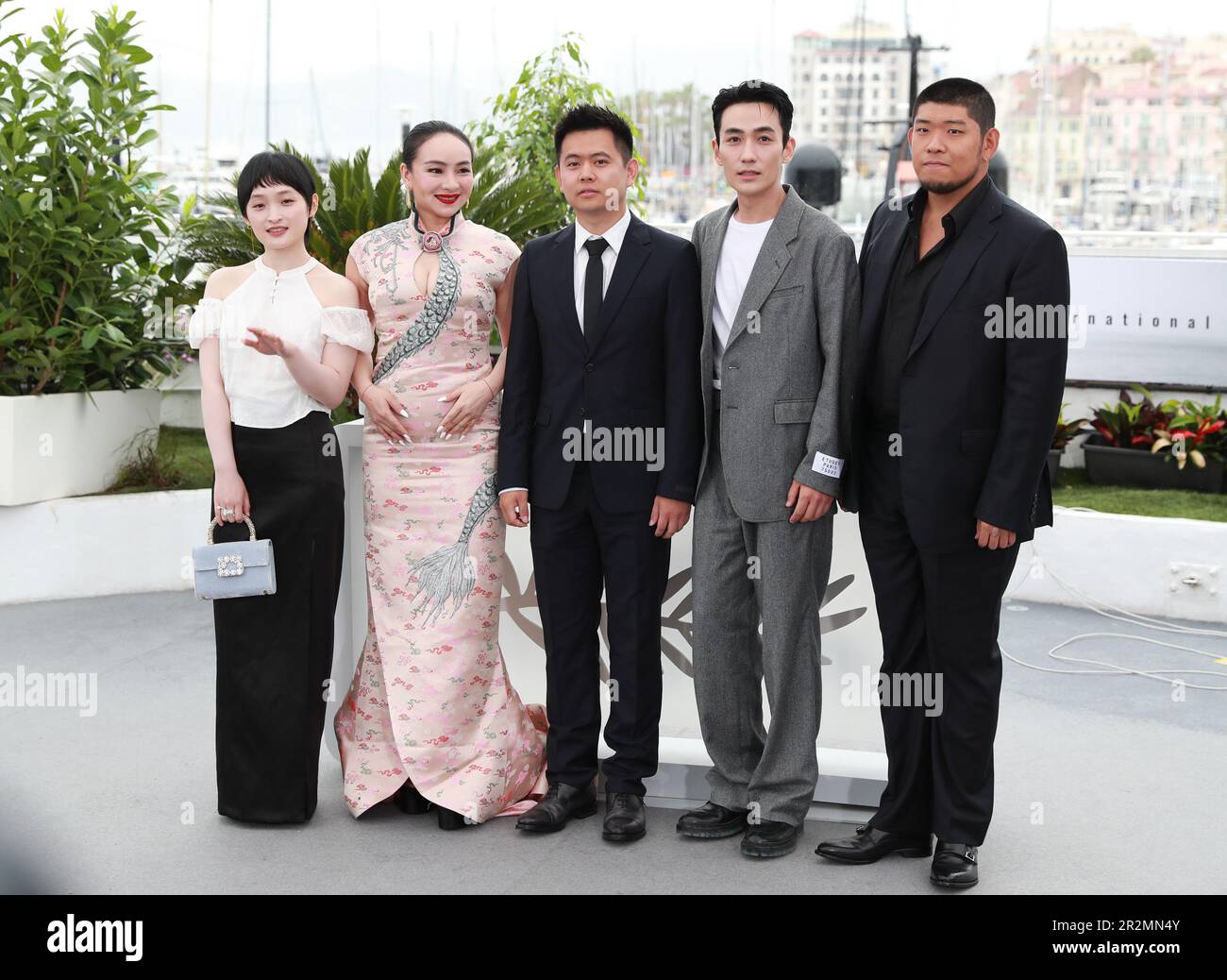Cannes, France. 20th May, 2023. Chinese director Wei Shujun (C), actor ...